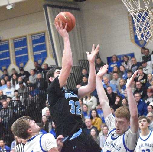 Bender's dunk highlights Lake Mills' 60-48 victory over Crosstown Rival ...