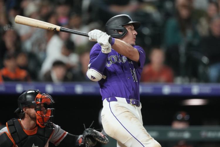 Jake McCarthy hits 2-run homer, drives in 4 runs in the Rockies' 8-3 ...