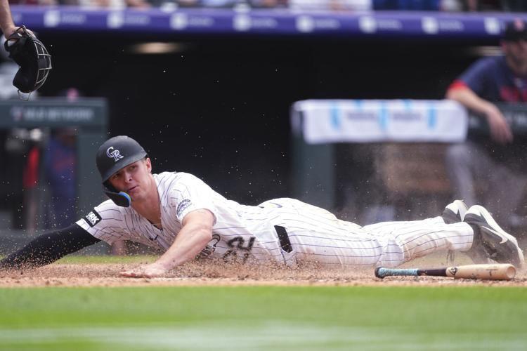 Freeman's bunt drives in go-ahead run, Carrigg has 3 RBIs as Rockies ...