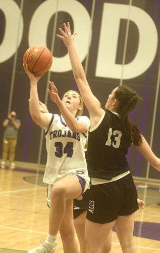 Girls basketball: Challengers overcome strong first half by Trojans ...