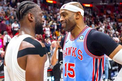 Wade outduels Carter as Heat defeats Hawks | Nation | daytonatimes.com