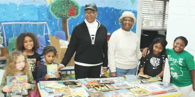 Library supporters donate books to children’s center | News ...