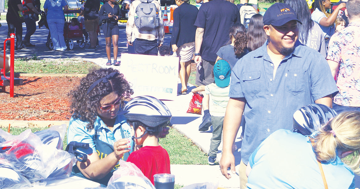 Pilot Club gives away helmets, bike safety information at Chiles ...