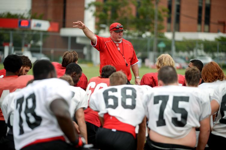 150 wins: Adcock has reputation for being demanding of players ...