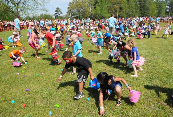 girl dropping easter eggs