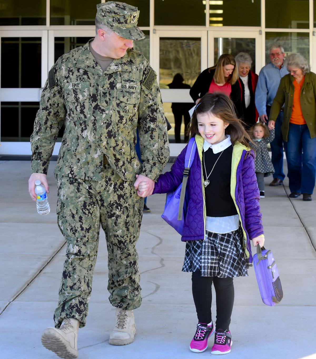 Decatur Heritage kindergartner surprised by dad, home from Navy duty ...