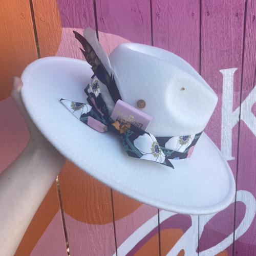 Local hat lovers have flipped their lids over the best little hat shop ...