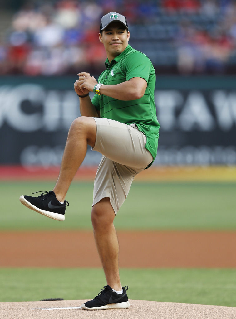 Fine enjoys experience of throwing out first pitch with Rangers ...