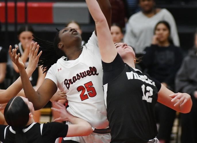 Girls hoops update: No. 2 Ryan tops district standings; No. 20 Braswell ...