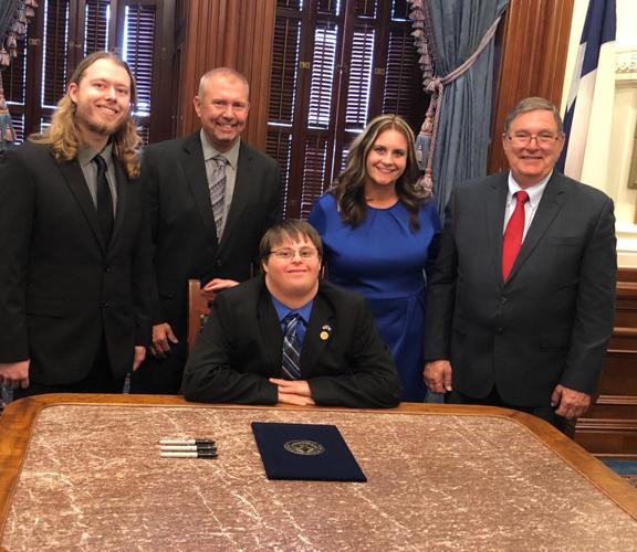 Abbott, with help from Sanger man, signs bill to ensure disabled ...