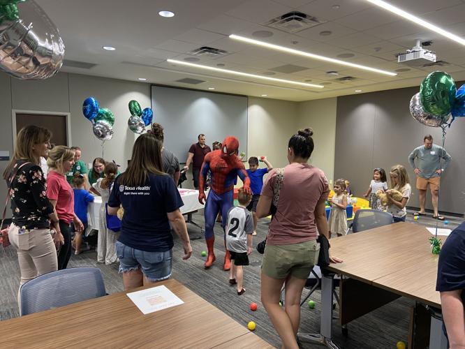 Twins reunite with Texas Health Denton staff for NICU awareness month ...