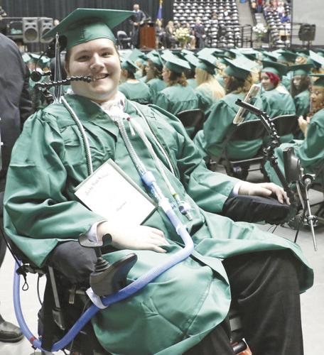 Paralysis doesn’t stop Harris from graduating with classmates ...