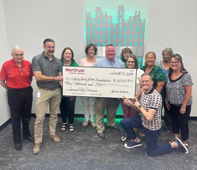 Meritrust donates to DHS college credit program | Derby Business News ...
