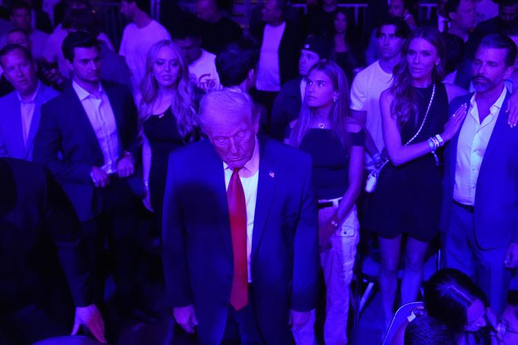 Trump takes the spotlight at UFC 327 in Miami, greeting Rogan and Rubio ...