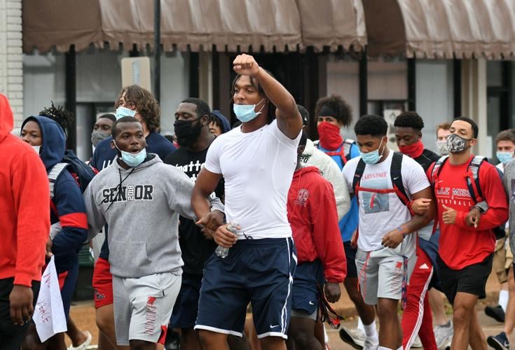 PHOTOS: Ole Miss football marches on the square | Sports | djournal.com