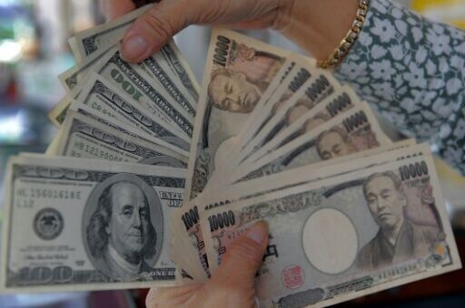 Dollar sinks on yen intervention talk, gold breaks $5,100 | News ...