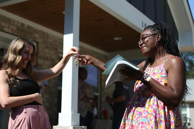 Habitat recipient praises God, receives keys to Verona home | Local ...