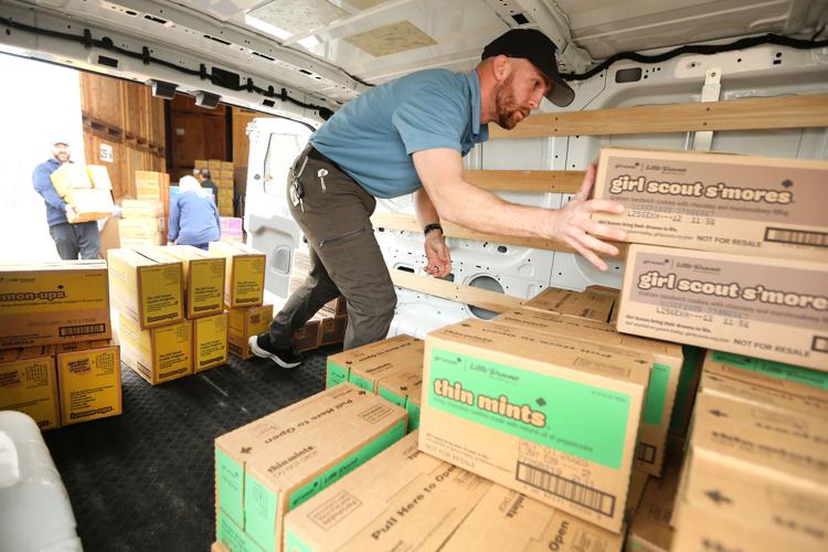 Girl Scouts pick up cookie orders; booth sales to begin later this week ...