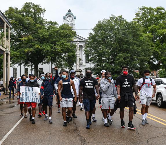 PHOTOS: Ole Miss football marches on the square | Sports | djournal.com