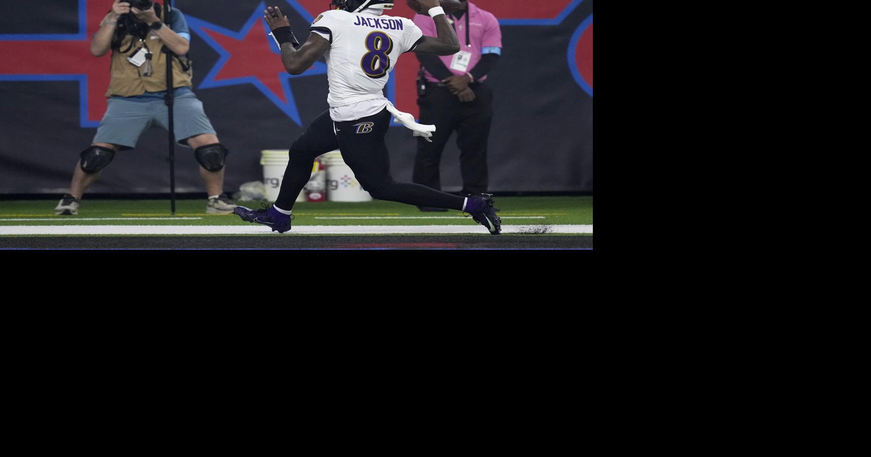 Jackson breaks QB rushing mark, Ravens romp | Professional sports ...