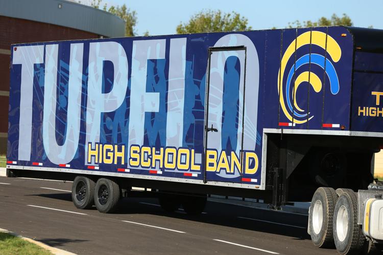 Tupelo High School band students surprised with new trailer wraps ...
