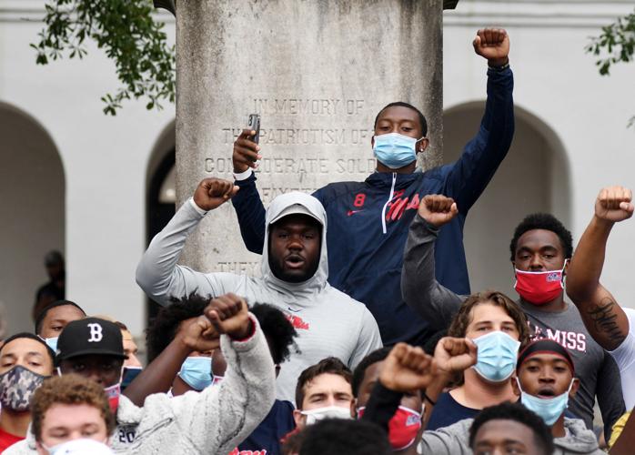 PHOTOS: Ole Miss football marches on the square | Sports | djournal.com