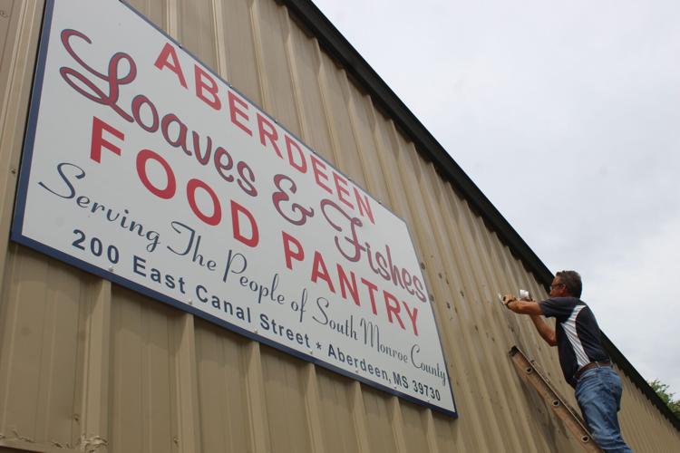 Local company donates security system to food pantry | News | djournal.com