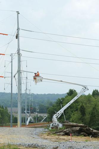 TVA hangs transmission line to city power substation project ...