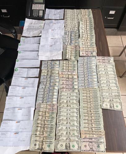 NA police charge two with counterfeit money, payroll checks | New ...