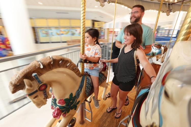Repairs complete, carousel running again at Mall at Barnes Crossing ...