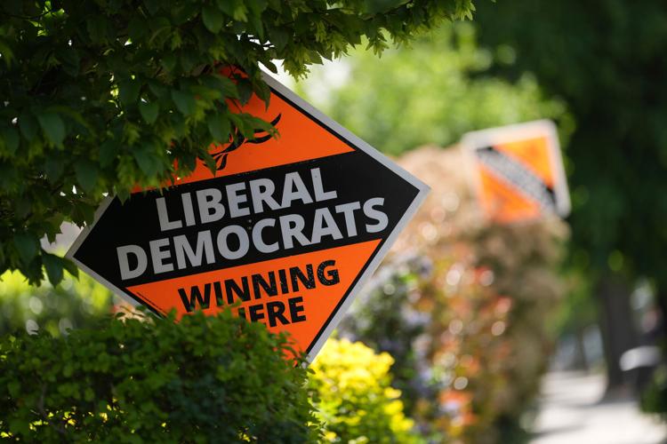 British voters cast ballots in local elections seen as a verdict on ...