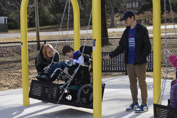 Tupelo hosts ribbon cutting for inclusive swing set at Veterans Park ...