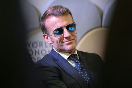 Macron squares up to Trump in rebel shades at macho Davos gathering ...