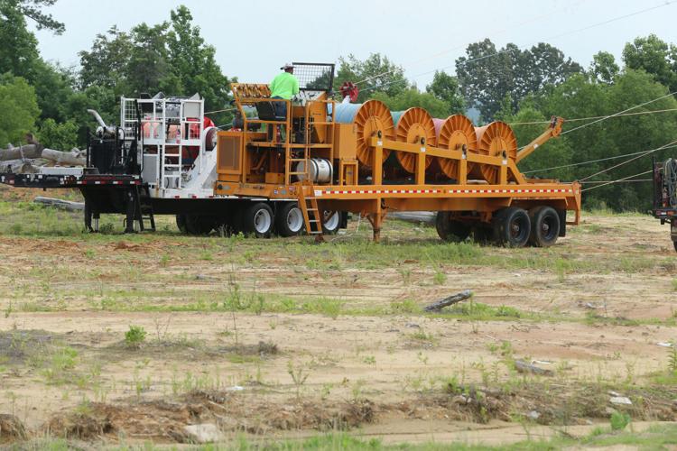 TVA hangs transmission line to city power substation project ...