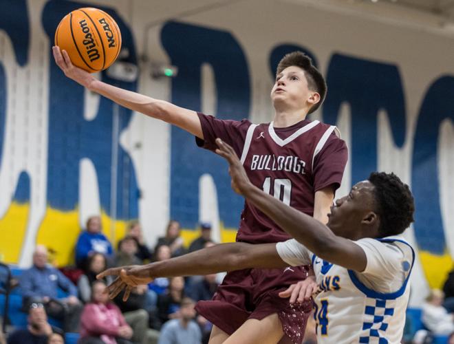 Falcons stay poised, hold off Bulldogs for district title | High School ...