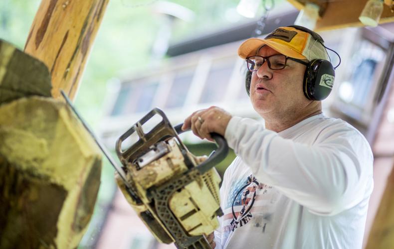Carving His Niche: Man's Chainsaw Art Makes Statement Across County ...