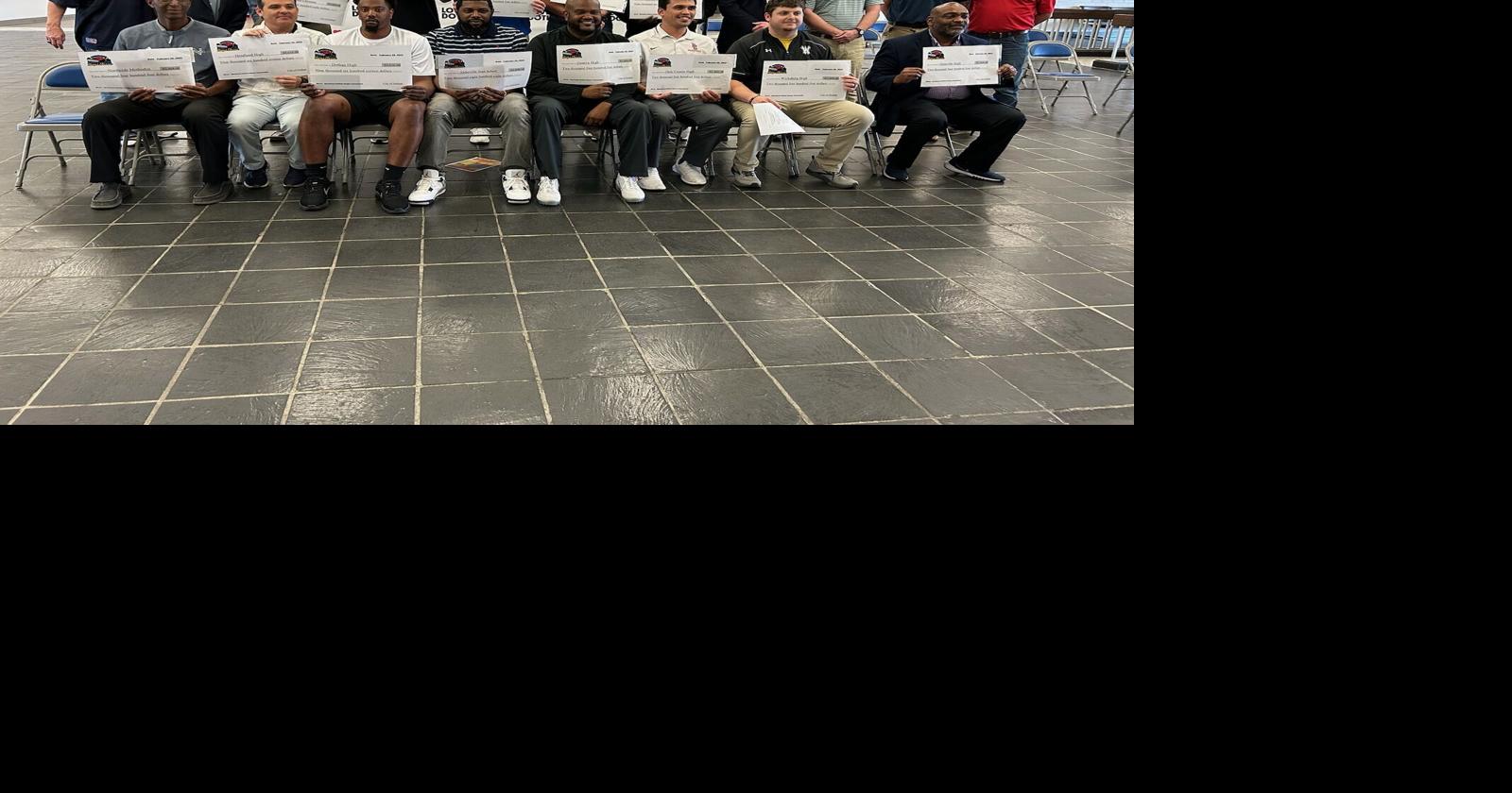 Dothan Hoops Classic checks presented to teams