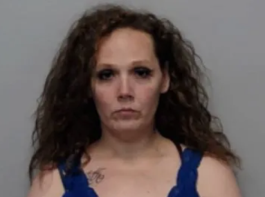 Woman charged after assaulting elderly residents