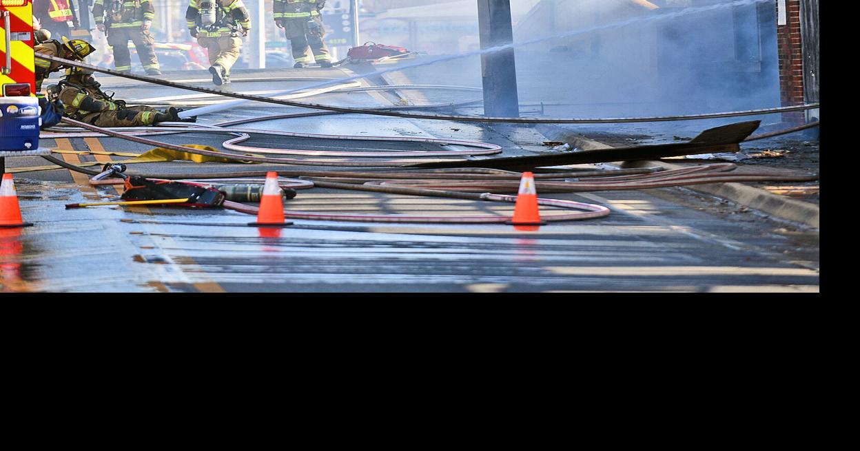 Firefighters extinguish two downtown fires