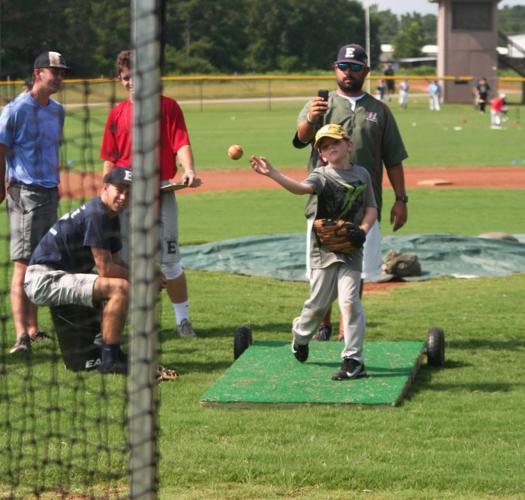 Enterprise High baseball team teaches fundamentals to area kids