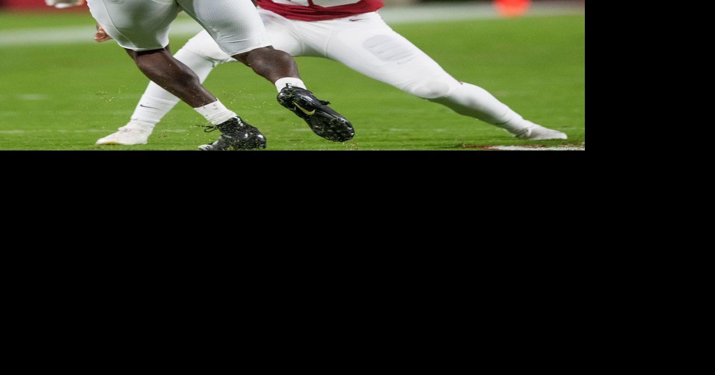 Alabama teammates embrace walk-on punter Perine