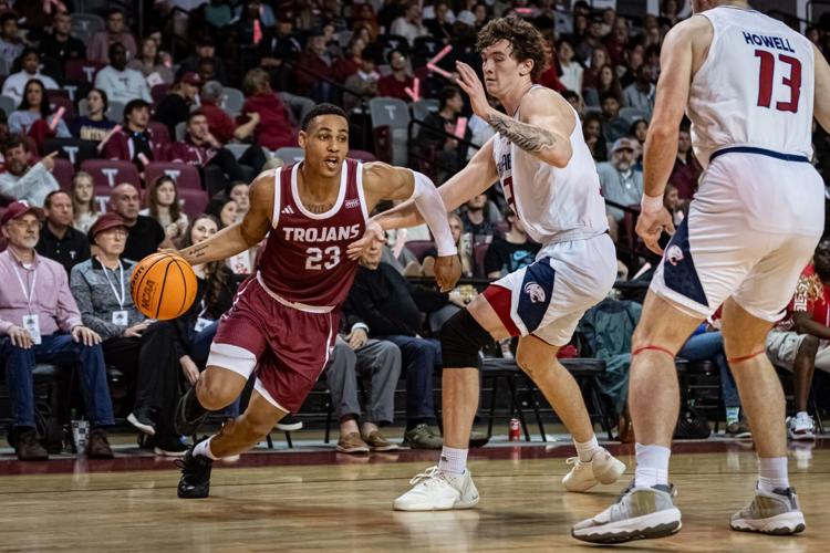 Troy men and women win in front of second largest attendance in Trojan ...