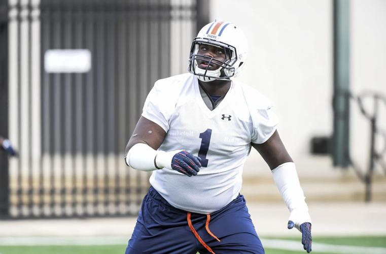 Auburn's Montravius Adams, Carl Lawson prep for last game as teammates
