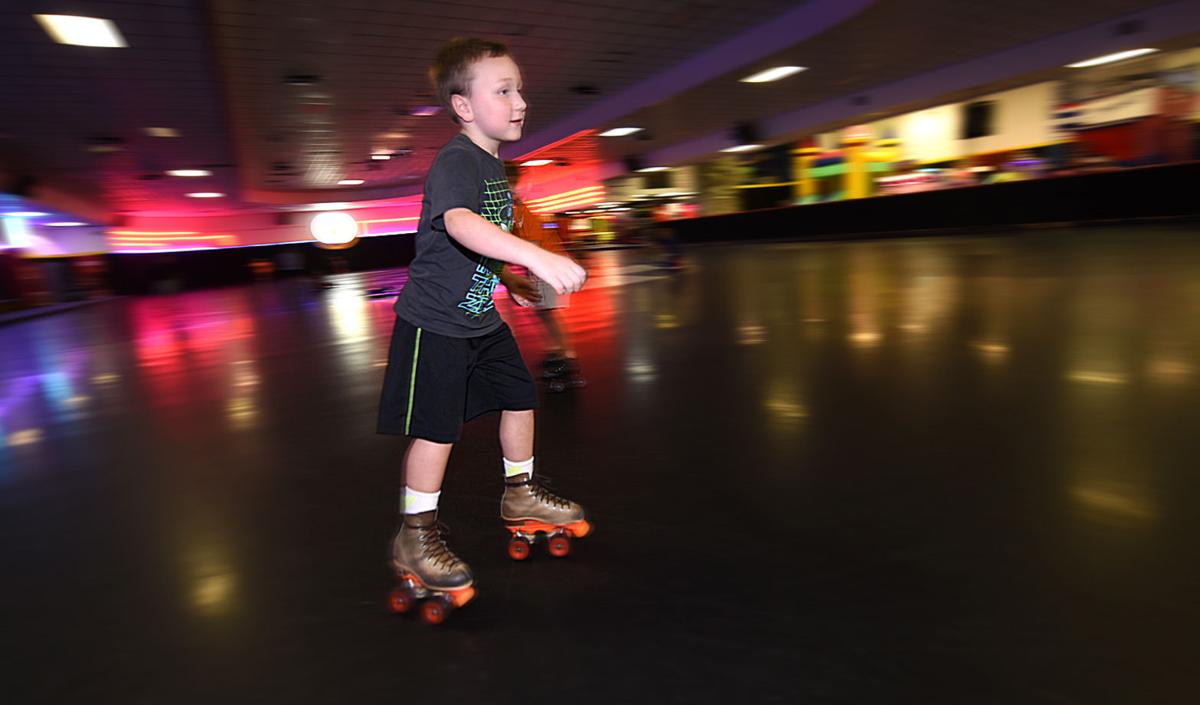 Students take a spin around the rink at Fun Zone after school program