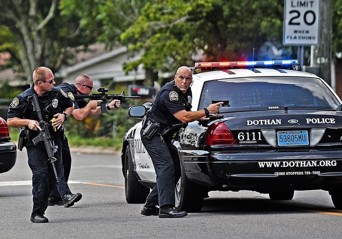 One dead in Monday afternoon shooting; police surround house on Sixth ...
