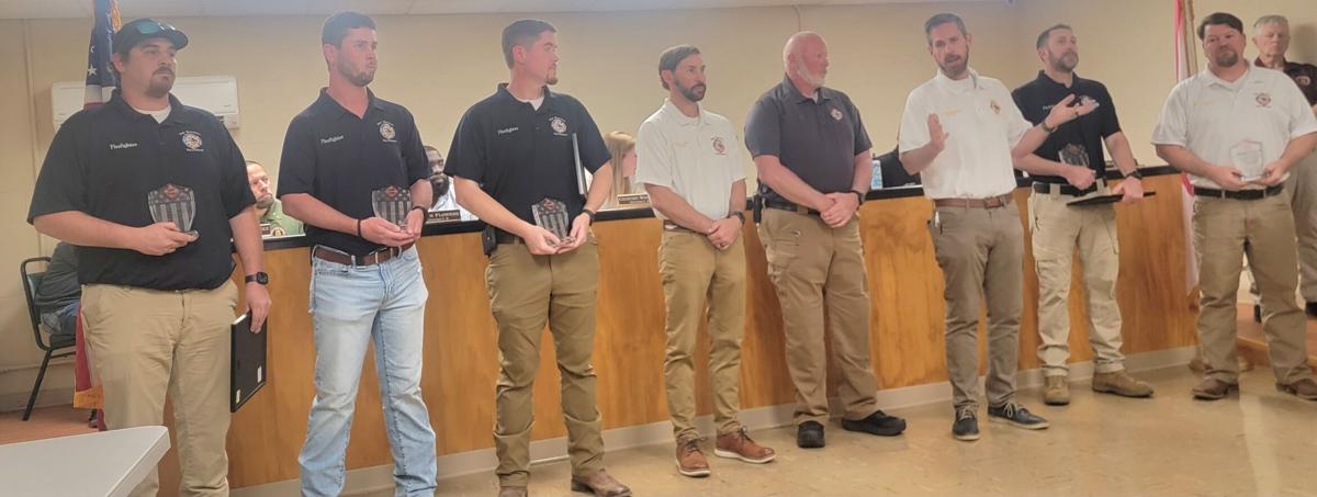 Eight 'selfless heroes' lauded for lifesaving rescue