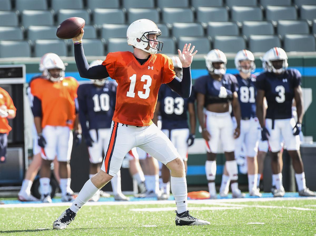 Auburn quarterback Sean White practicing in full
