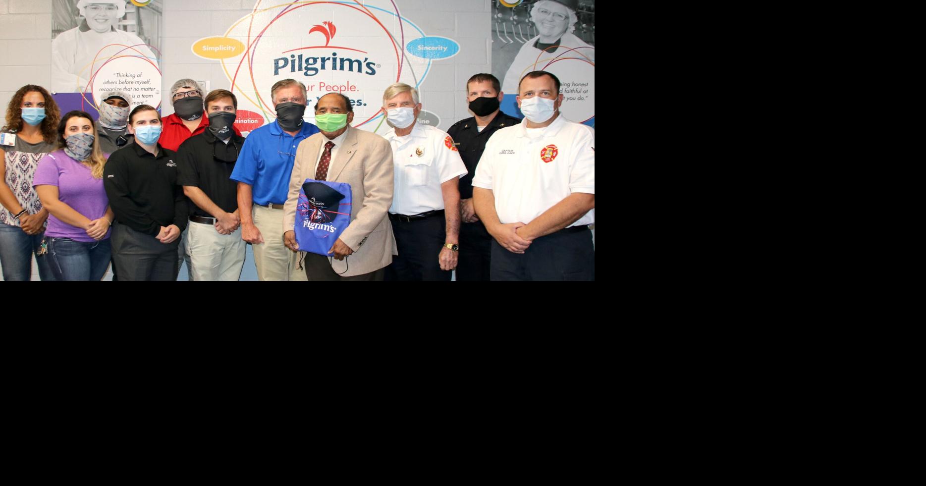 Enterprise leaders tour Pilgrim’s chicken processing plant