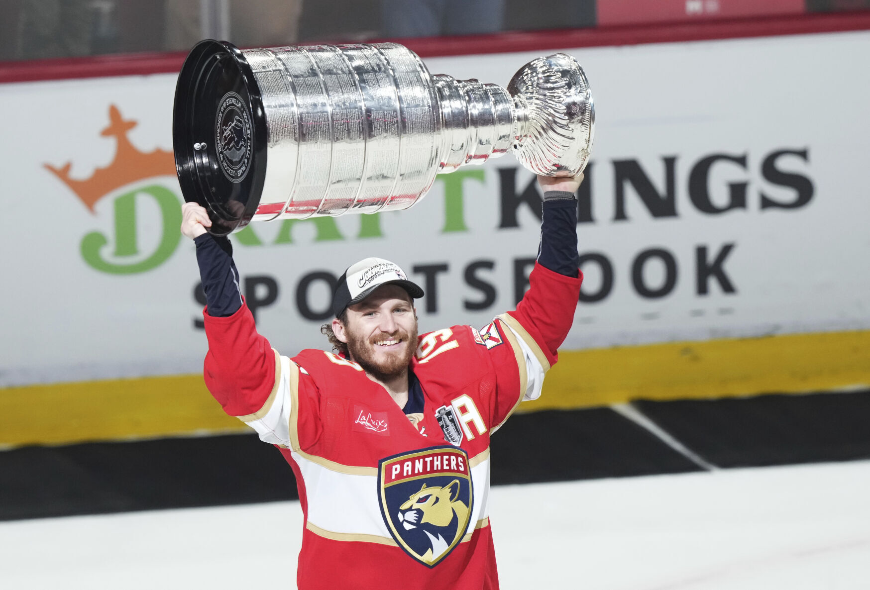 NHL camps open with McDavid unsigned, Panthers' Tkachuk out