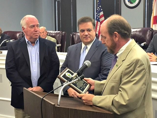 County commission honors retiring county attorney Gary Sherrer